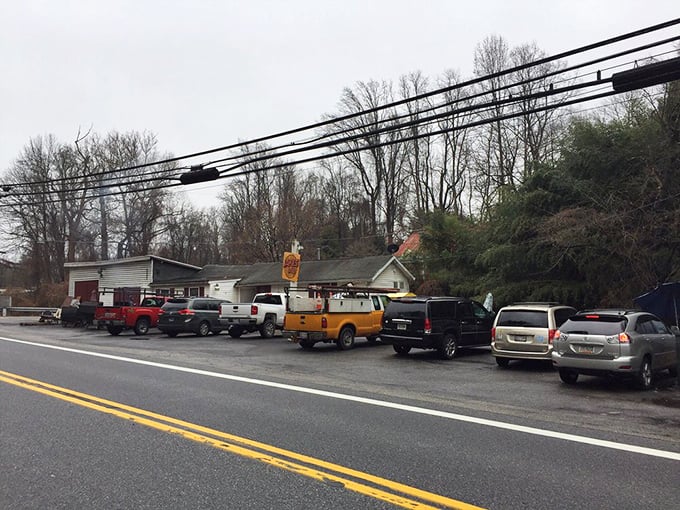 A parking lot full of vehicles tells the real story—when locals line up like this, you know you've found the genuine article. BBQ democracy in action.