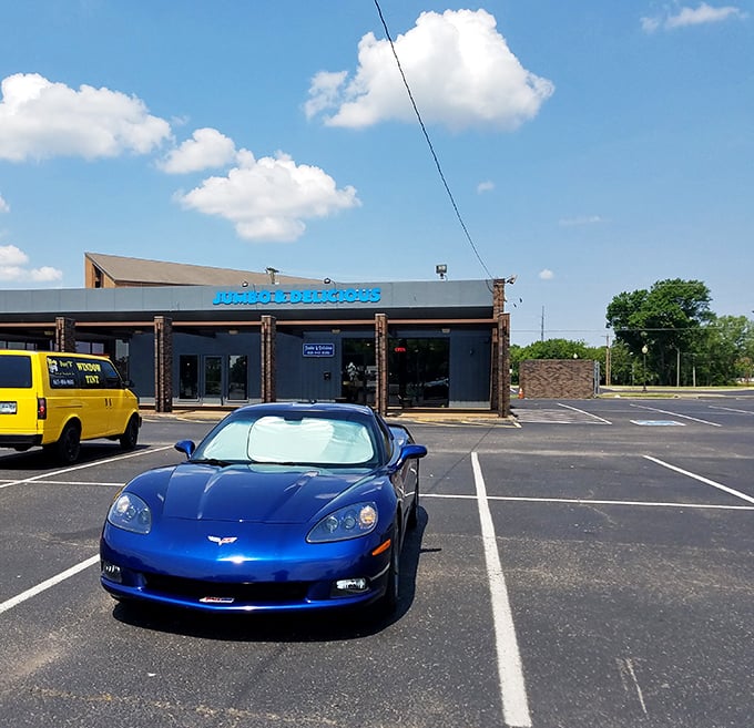 Even fancy cars need comfort food. The blue Corvette knows what's up—sometimes the best dining experiences come in the most unassuming packages.