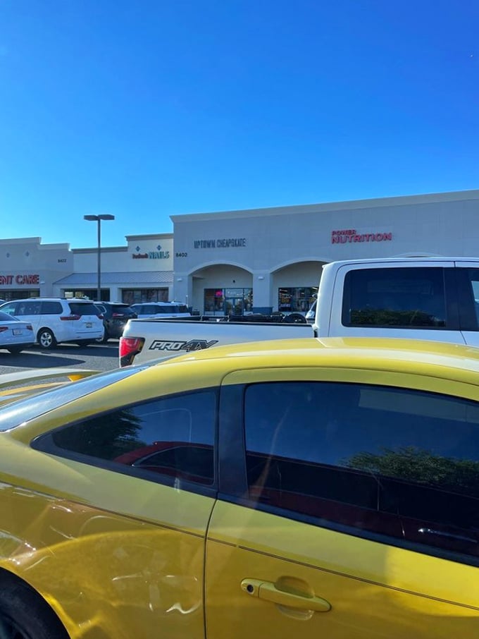 Even the parking lot screams Arizona—blindingly bright sunshine, pristine asphalt, and the promise of air-conditioned bargains inside.
