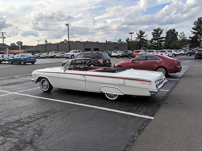 Even the parking lot tells a story—classic cars and modern SUVs sharing space, just like the generations who gather inside to break bread together.