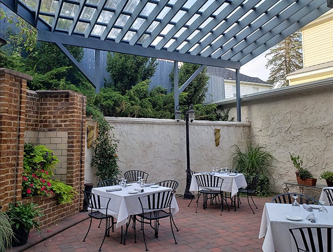 Outdoor dining that captures that magical summer evening vibe – where conversations linger as long as the twilight.