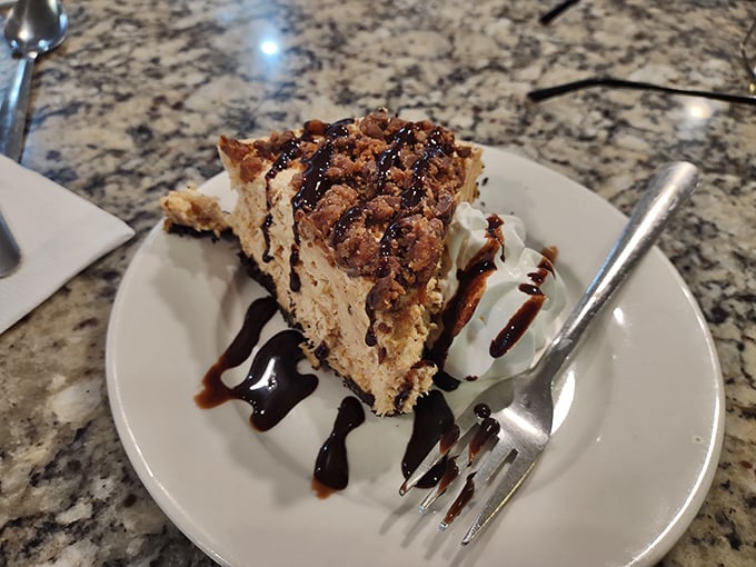 Peanut butter pie that would make Elvis weep—a cloud-like filling on chocolate crust with just enough drizzle to make it Instagram-worthy.