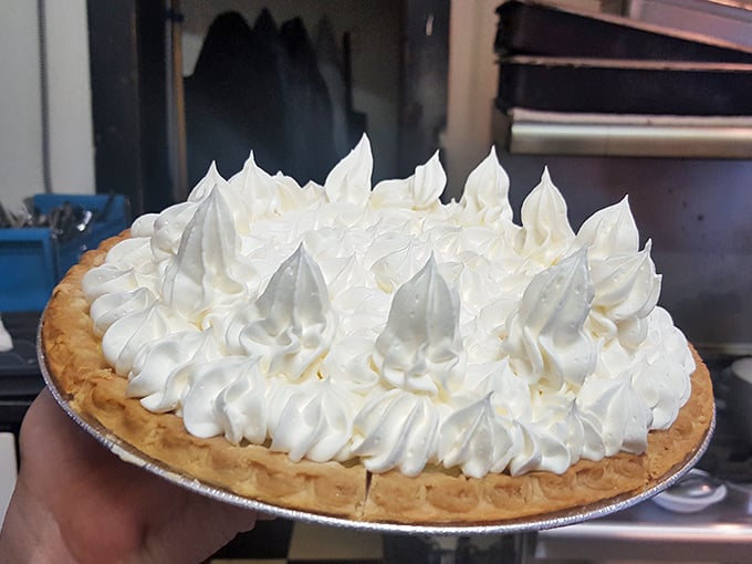 A mile-high meringue pie that doesn't just end a meal—it punctuates it with an exclamation point of sweetness.