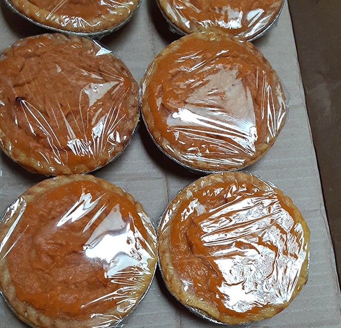 Sweet potato pies waiting for their moment to shine. After a barbecue feast, these aren't just dessert – they're the encore performance.