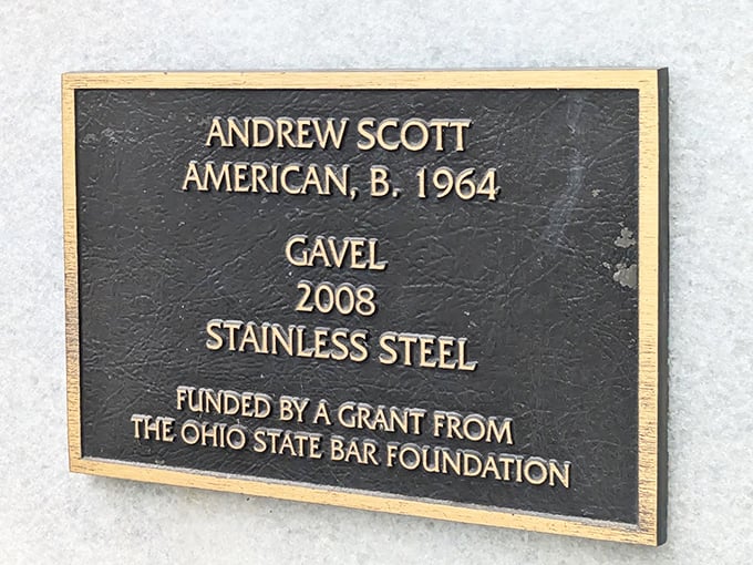 The plaque reveals the gavel's origin story—created by artist Andrew Scott in 2008 and funded by the Ohio State Bar Foundation. Every superhero needs an origin tale.