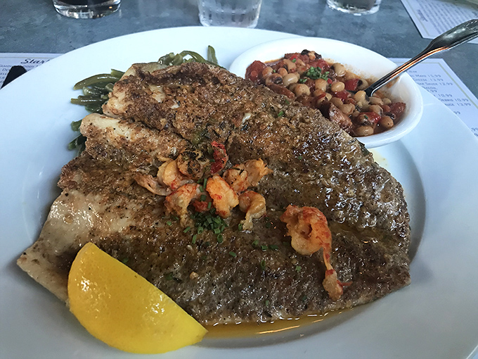 Sea bass that's dressed to impress, with shrimp companions that refused to let it hog all the spotlight.