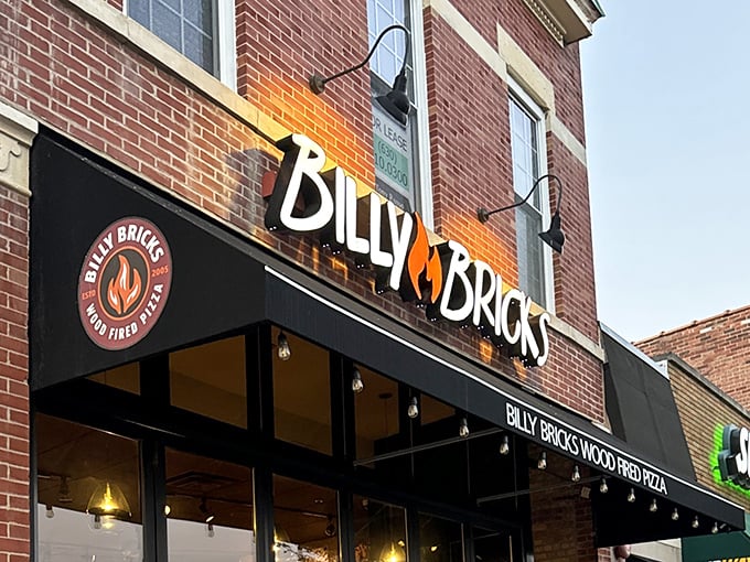 The Billy Bricks sign stands proud, like a superhero emblem for those who fight the good fight against mediocre pizza.