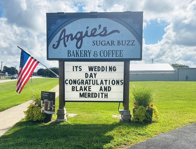 The roadside sign doesn't just announce a bakery—it celebrates love with personalized congratulations, proving small towns still do it best.