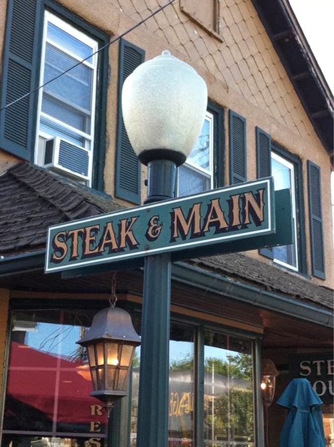 The iconic Steak & Main sign—where countless food pilgrimages begin and diet resolutions go to die.