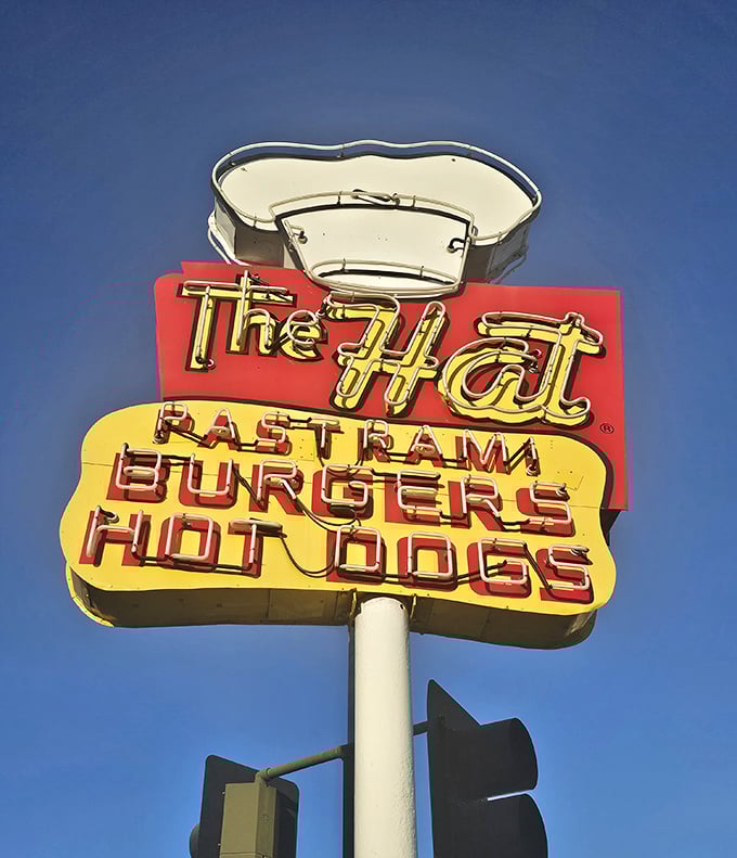 That iconic sign against the California blue sky—a landmark that's guided hungry travelers to pastrami paradise for generations.