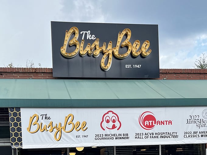 The sign that beckons food lovers from across Georgia. Those awards aren't just decorations—they're well-earned badges of culinary honor.