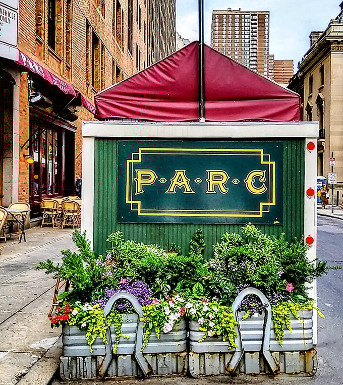 The flower-adorned Parc sign stands as a cheerful sentry, welcoming hungry pilgrims to this temple of French gastronomy in the heart of Philadelphia.