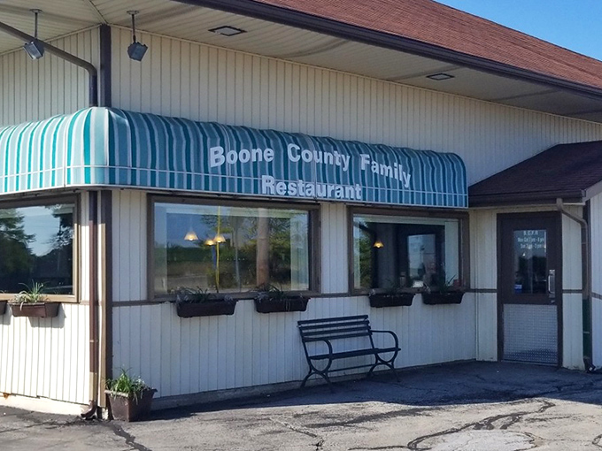That classic striped awning signals to hungry travelers they've found the real deal—a genuine small-town eatery where authenticity isn't just marketed, it's lived.