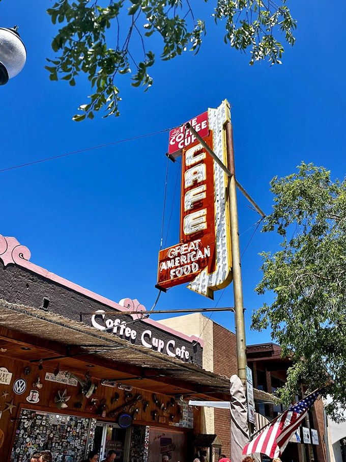 That sign against the blue desert sky isn't just advertising – it's a beacon of hope for hungry travelers and a landmark for locals who know where breakfast bliss awaits.