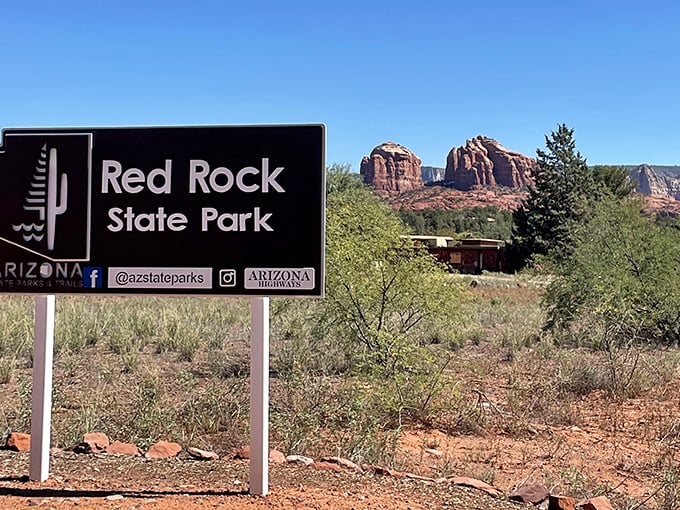 The sign that marks the beginning of wonder. Behind it stands the reason you drove all this way—and it was absolutely worth it.