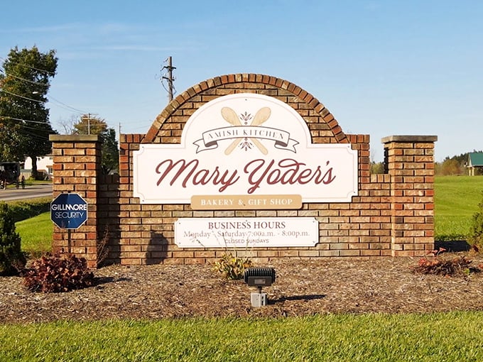 The sign announces business hours and promises—this is where locals and travelers alike come to eat very, very well.
