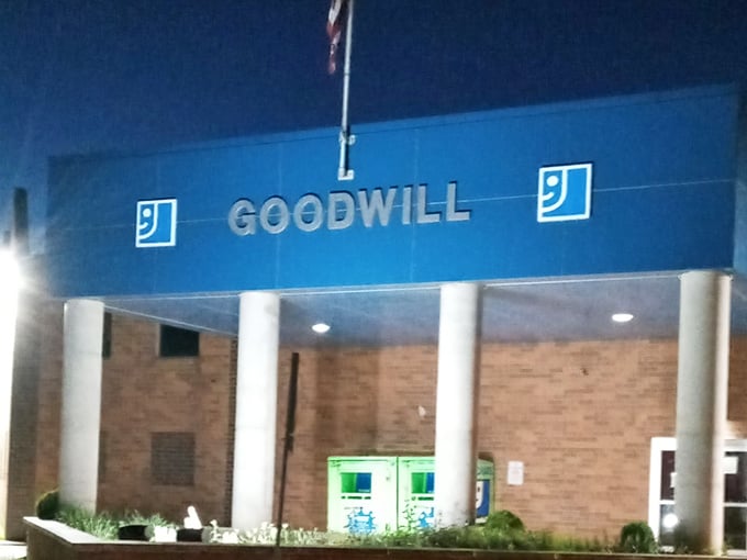 Even after hours, the Goodwill sign glows like a promise—tomorrow brings new donations, new treasures, and new chances to strike secondhand gold.