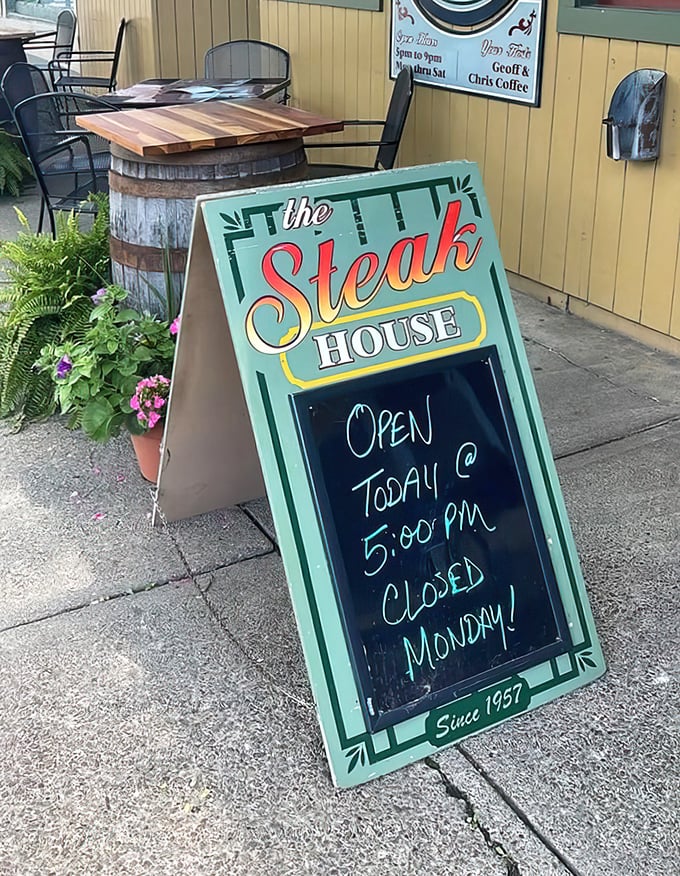 The sidewalk sign promises 5pm opening and Monday closure—information worth planning your entire week around once you've tasted what's inside.