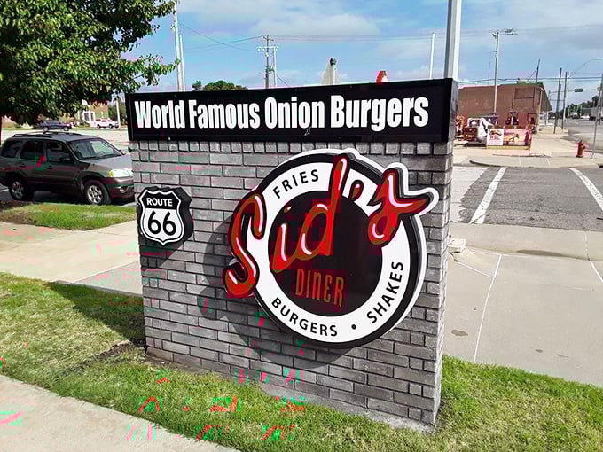 The sign says "World Famous Onion Burgers" – and after one bite, you'll wonder why they're being so modest about it.