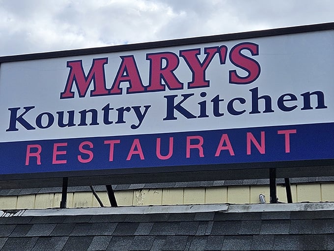 The sign says "Mary's Kountry Kitchen" but might as well read "Welcome Home" – a beacon of comfort food in an ever-changing world.