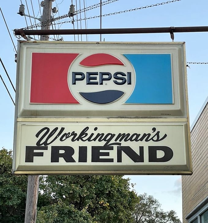 The vintage Pepsi sign has guided hungry travelers for decades – a beacon of burger hope in an increasingly complicated culinary landscape.