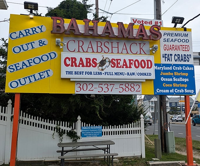 The sign promises "FAT CRABS" and "THE BEST FOR LESS"—two phrases that should be on Delaware's state seal.