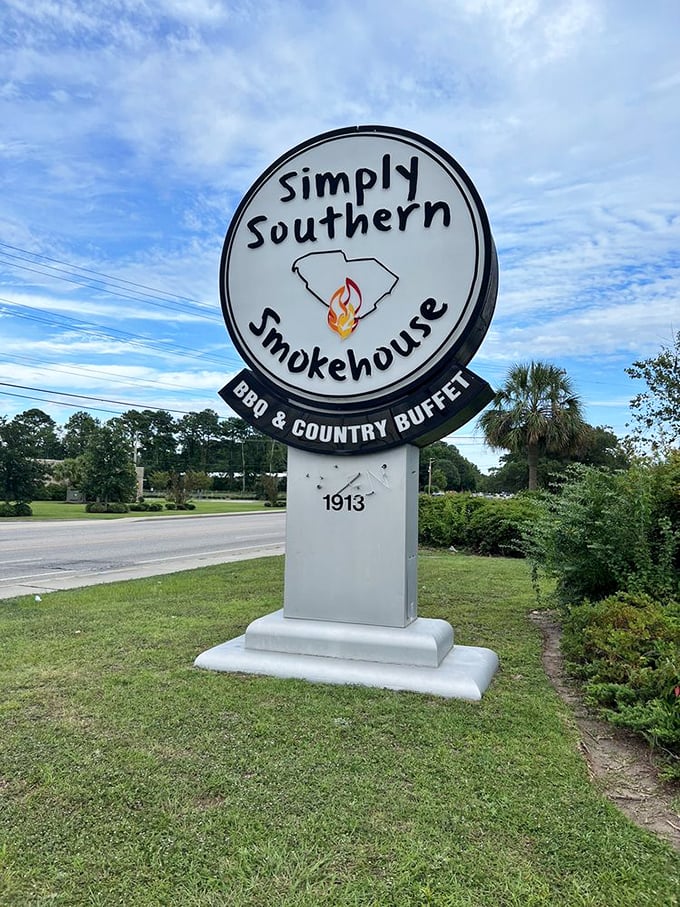 The sign says it all: BBQ & Country Buffet with the outline of South Carolina aflame—a beacon of hope for hungry travelers and locals alike.