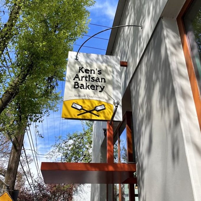 The iconic sign against Portland's blue sky—a rare combination as perfect as butter and bread. Your taste buds' North Star in a city of culinary constellations.
