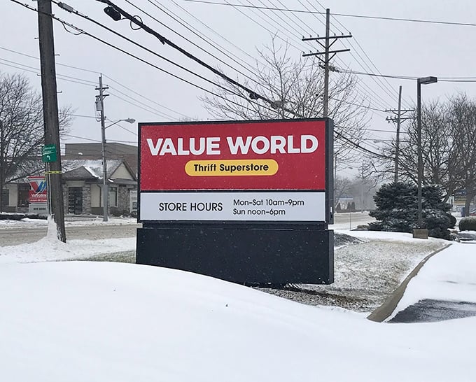 Even in winter, Value World's sign stands bright against the snow, promising warm deals inside its thrifty wonderland.