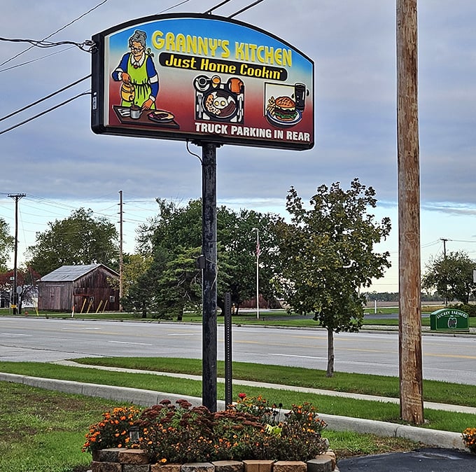 The sign promises exactly what awaits inside—"Just Home Cookin'" isn't marketing speak, it's a straightforward guarantee that's honored with every plate served.