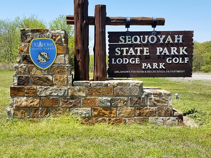 This welcoming sign promises state park adventures, lodge comfort, and golf—basically everything except an excuse to stay home watching television.