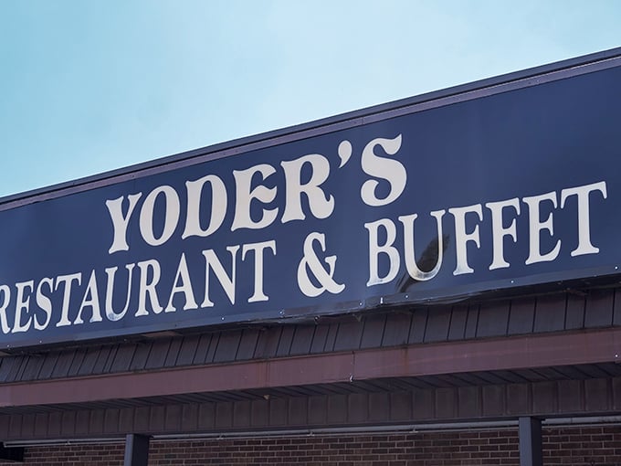 The iconic blue signage of Yoder's stands out against the sky—like a beacon of hope for travelers wondering if they'll ever eat well on the road again.