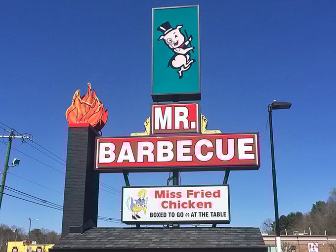 That iconic pig in a top hat says everything you need to know – this place takes its barbecue seriously, but itself? Not so much.