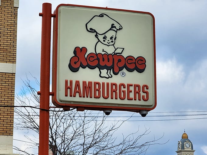 That vintage sign stands as a beacon of hope for burger purists everywhere—a reminder that some traditions are worth preserving in their perfect, unchanged glory.