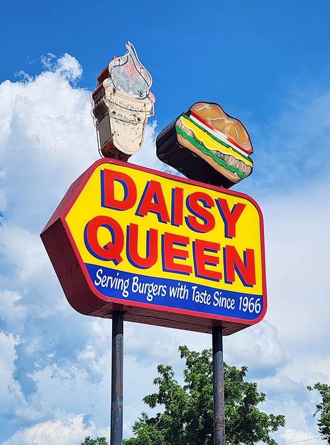 That sign has been calling to hungry travelers since 1966, like a beacon of burger hope.