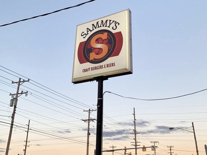 The Sammy's sign against a twilight sky – a beacon of hope for the hungry traveler and a promise of deliciousness to come.