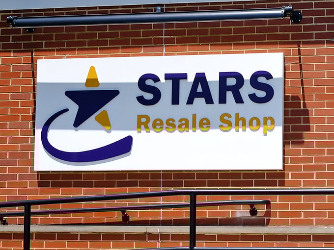 The STARS logo shines against brick—a beacon for treasure hunters, budget-conscious shoppers, and anyone who understands that "pre-loved" often means "better quality."