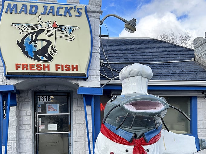 The iconic sign and catfish chef – Mad Jack's unmistakable calling card. This local landmark has guided hungry seafood lovers to flavor paradise for years.