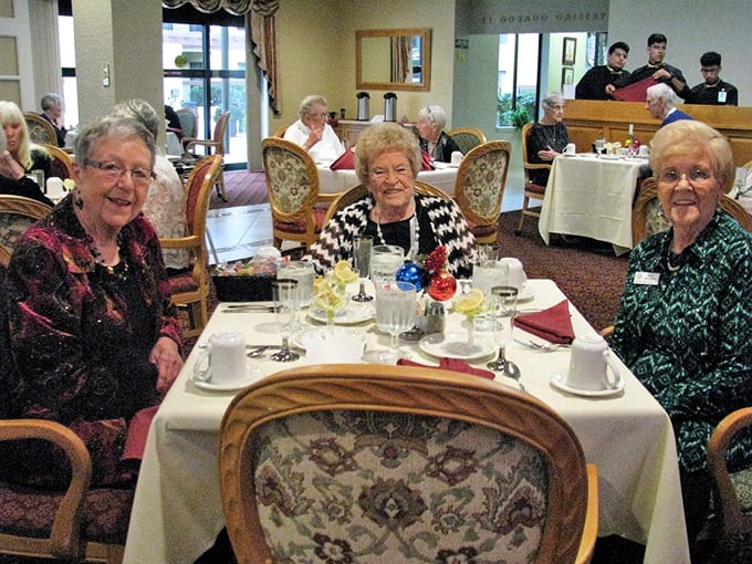 Dining with friends—the real luxury of retirement isn't the amenities, it's having time to linger over meals without watching the clock.