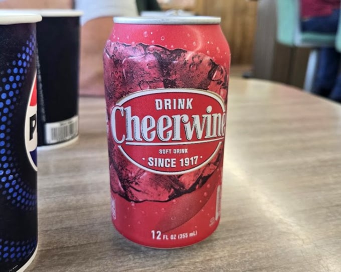 A frosty Cheerwine—the cherry-flavored soda that's been the perfect North Carolina companion to burgers and dogs since 1917.