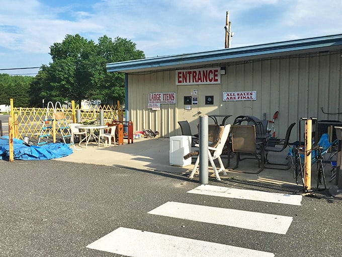 The entrance to bargain paradise, where outdoor furniture waits patiently for new patios to call home.