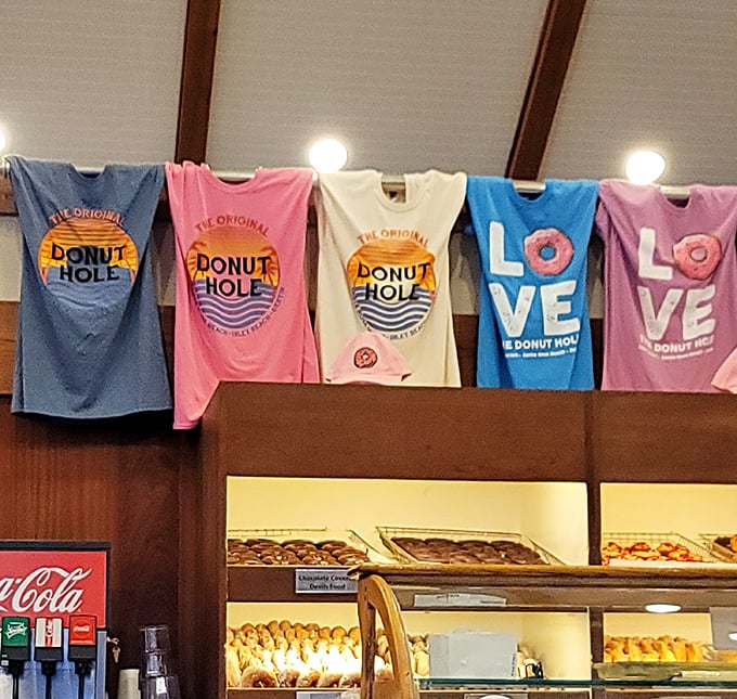Donut Hole merch hanging proudly – because wearing your food allegiance on your chest is the ultimate badge of culinary honor.