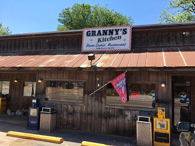 Granny's Kitchen stands proud against the Arkansas sky, its sign promising "Home Cookin'" – three syllables that translate to "Get in here now" in any language.