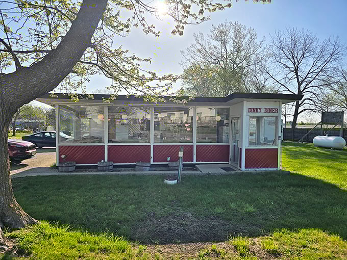 Morning light bathes the diner in a golden glow, as if nature itself is highlighting this culinary treasure for passing motorists.