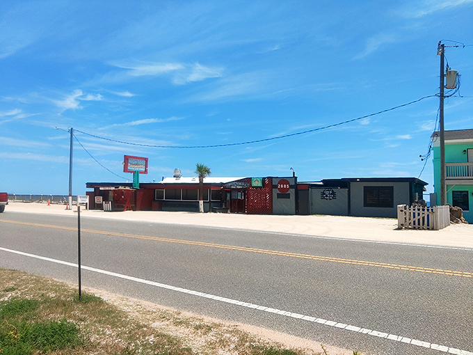 From the road, it looks unassuming—but that's the universal truth of great beach spots: the more modest the exterior, the more extraordinary the experience inside.