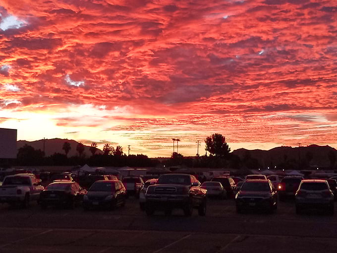 Nature provides the most spectacular pre-show entertainment—a California sunset painting the sky in impossible shades of crimson and gold.