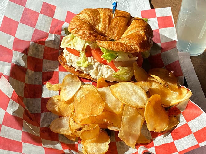 A croissant sandwich that's bursting with freshness – the kind of lunch that makes you wonder why you ever waste time with drive-thru windows.