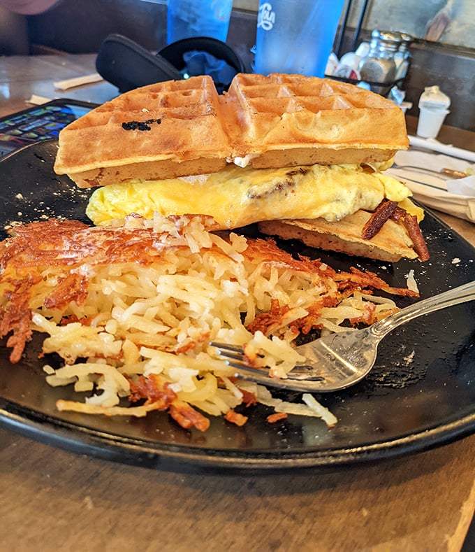 The waffle sandwich—breakfast's greatest innovation since someone decided coffee should be portable. Savory, sweet, and utterly ingenious.