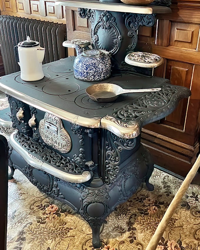 This ornate stove didn't just cook meals – it was the household's beating heart. More intricate than most modern kitchen renovations and twice as functional.