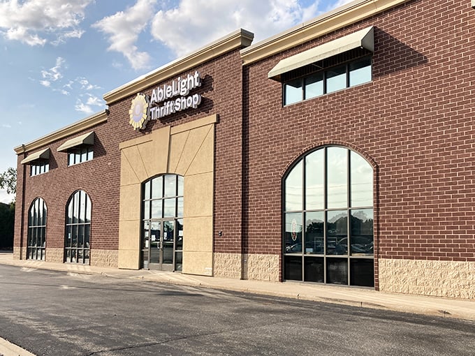 The brick facade of AbleLight Thrift Shop beckons with promise—like a treasure chest waiting to be opened by savvy shoppers.